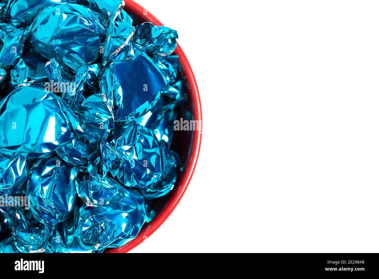 A Bowl of Blue Wrapped Candy Isolated on a White Background Stock Photo ...