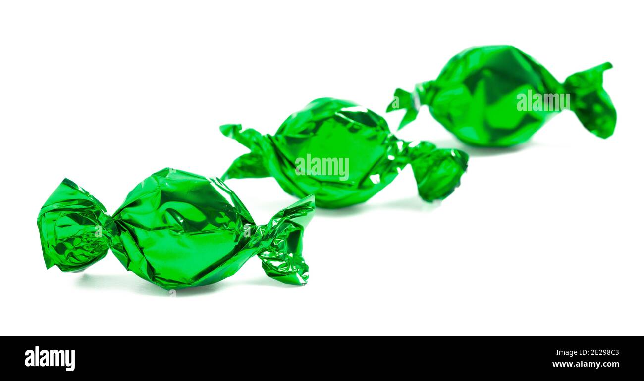 Three Wrapped Green Candy Isolated on a White Background Stock Photo ...