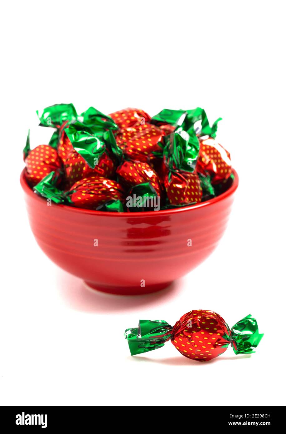 Wrapped Strawberry Candy in Decorative Foil Wrapper Stock Photo - Alamy