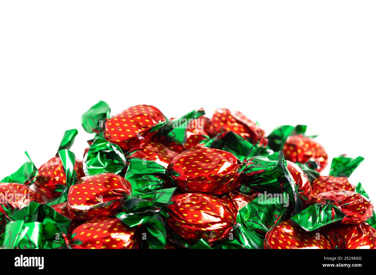Wrapped Strawberry Candy in Decorative Foil Wrapper Stock Photo - Alamy