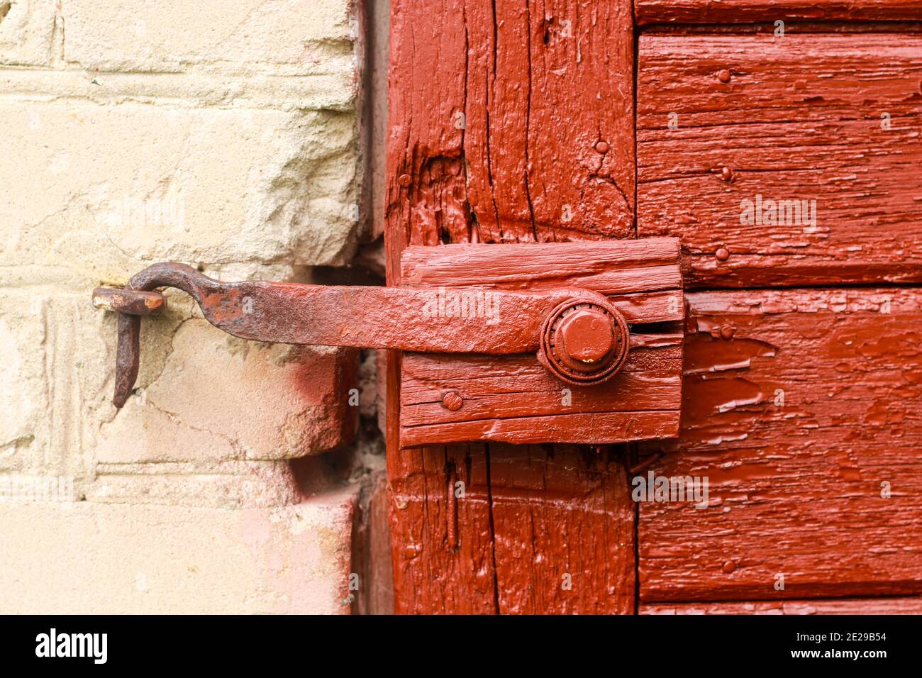 Closeup shot of an old metal lock on a wooden door Stock Photo - Alamy