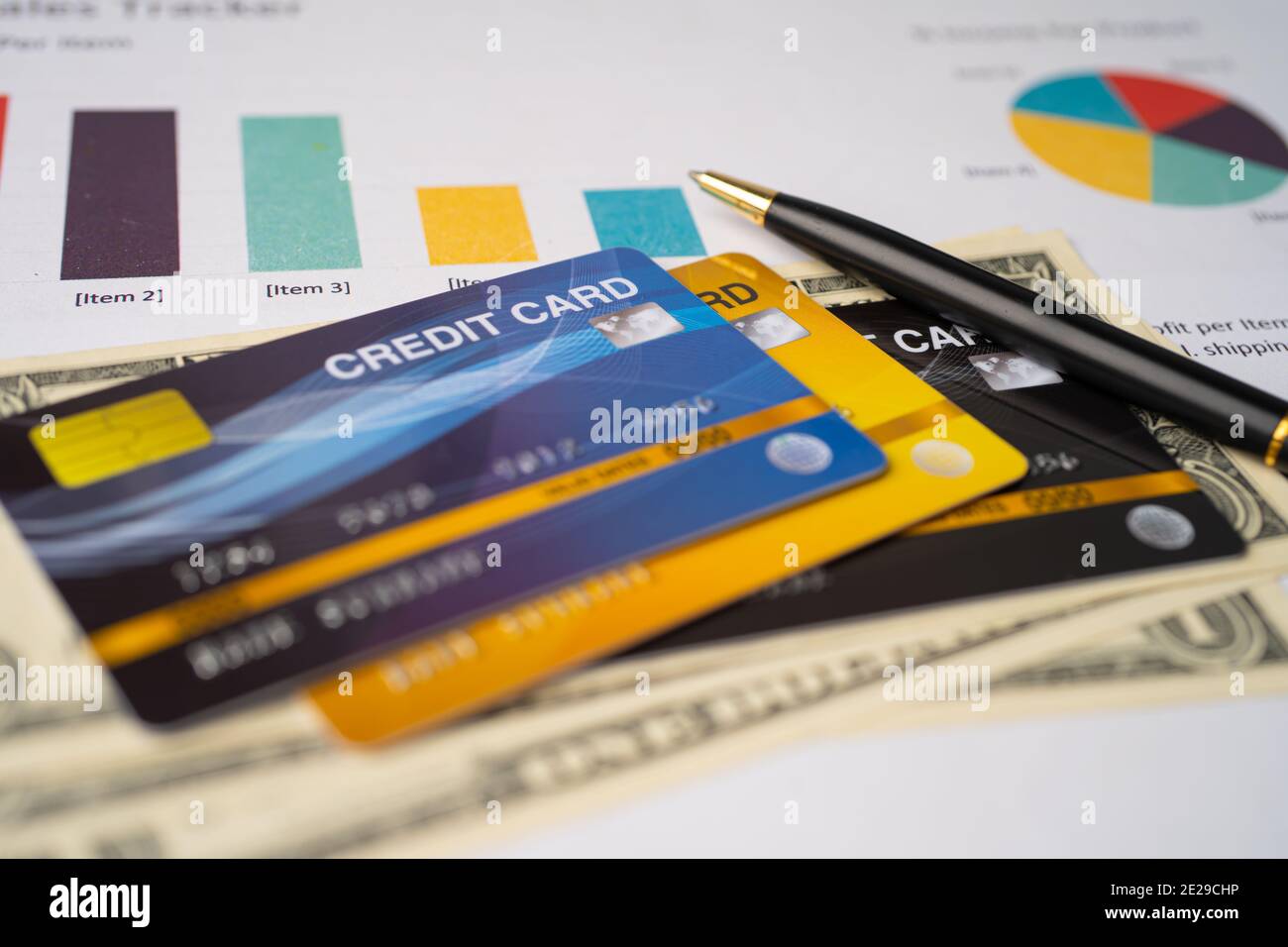 Credit card on chart and graph paper. Finance development, Banking ...