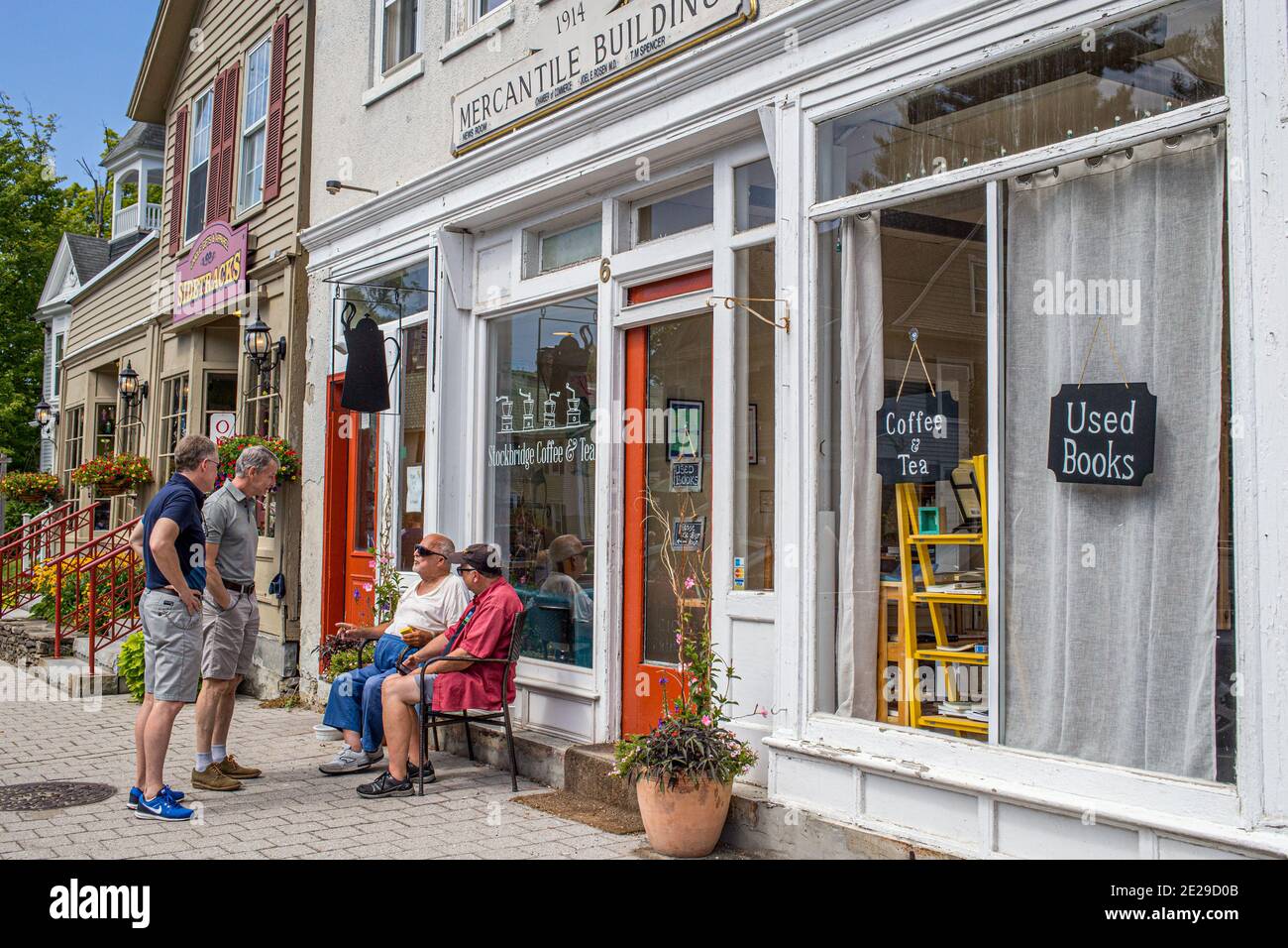 People talking outside in front of some Stockbridge, Massachusetts ...