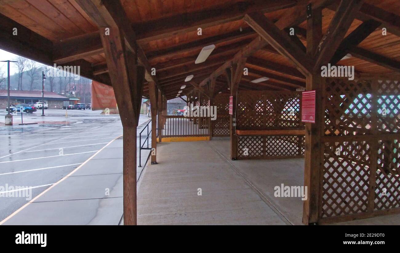 Cherokee, NC USA 03 03 20: A wooden shelter and view of a police car in ...