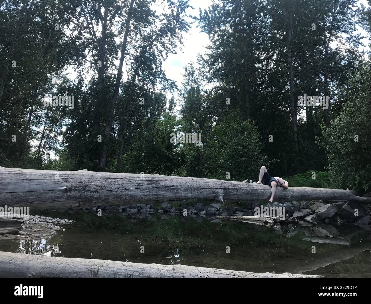 Hanging around Goat River Stock Photo - Alamy
