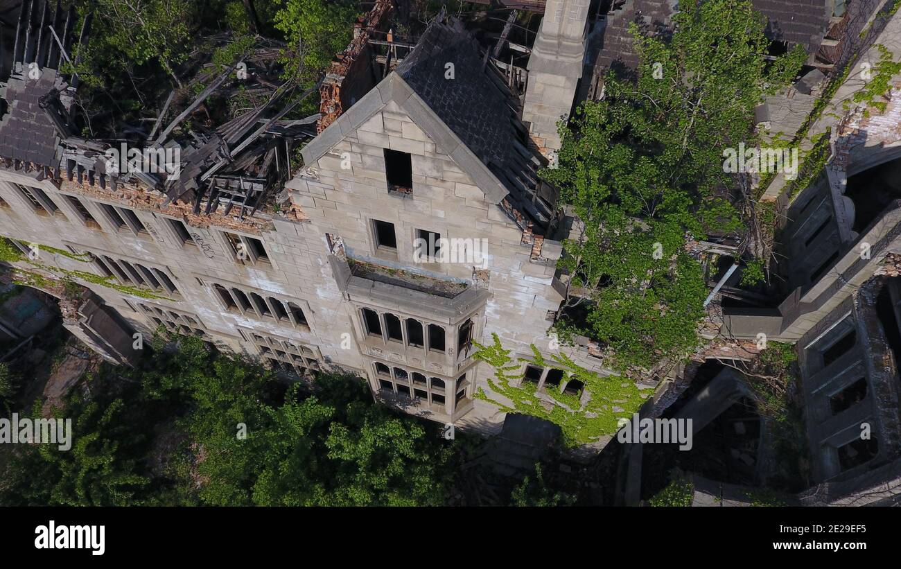 Aerial shot of on old abandoned building damaged after the earthquake ...
