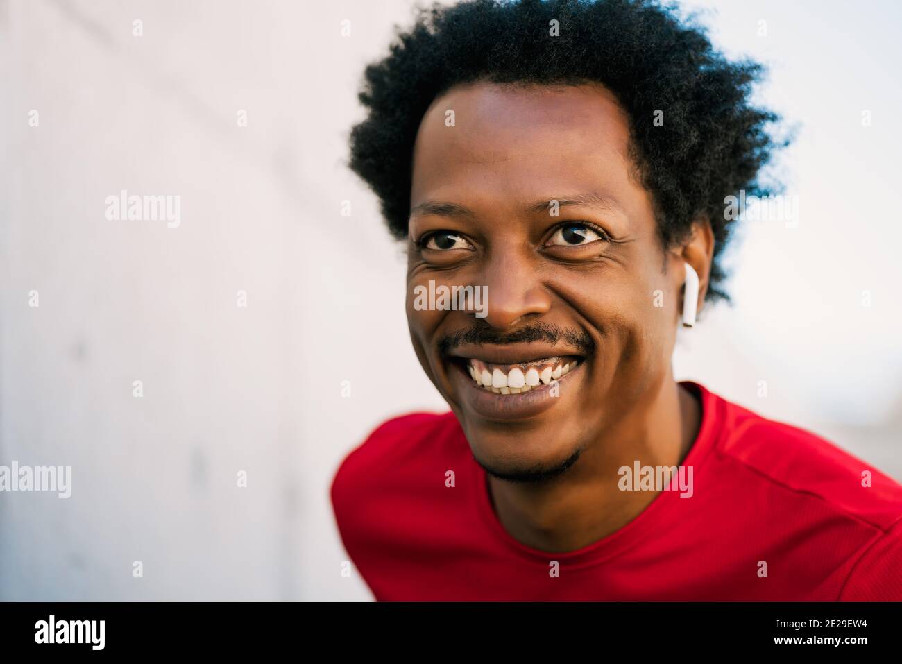Athletic man running and doing exercise outdoors Stock Photo - Alamy