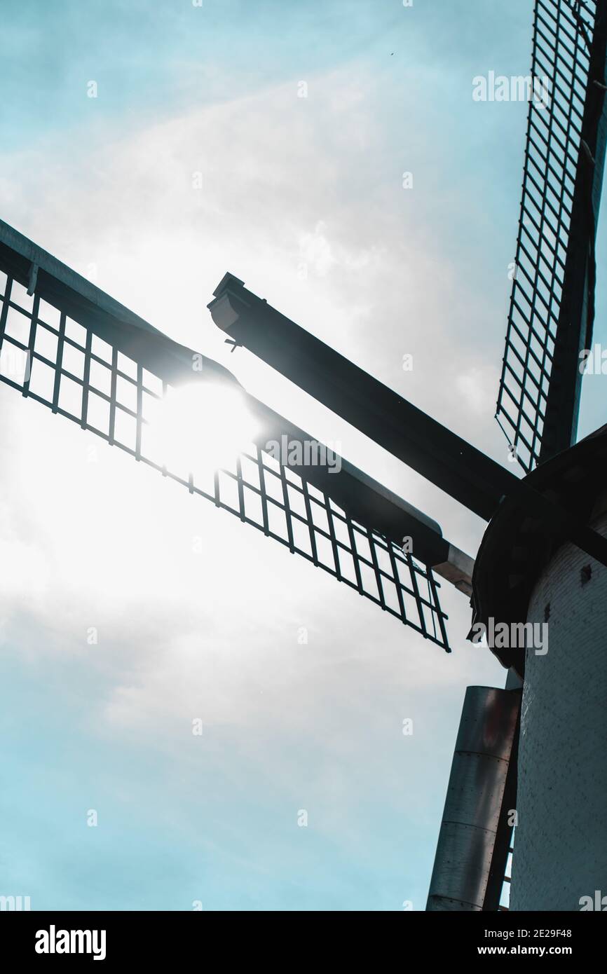Vertical shot of traditional windmill wings in the sunlight Stock Photo ...