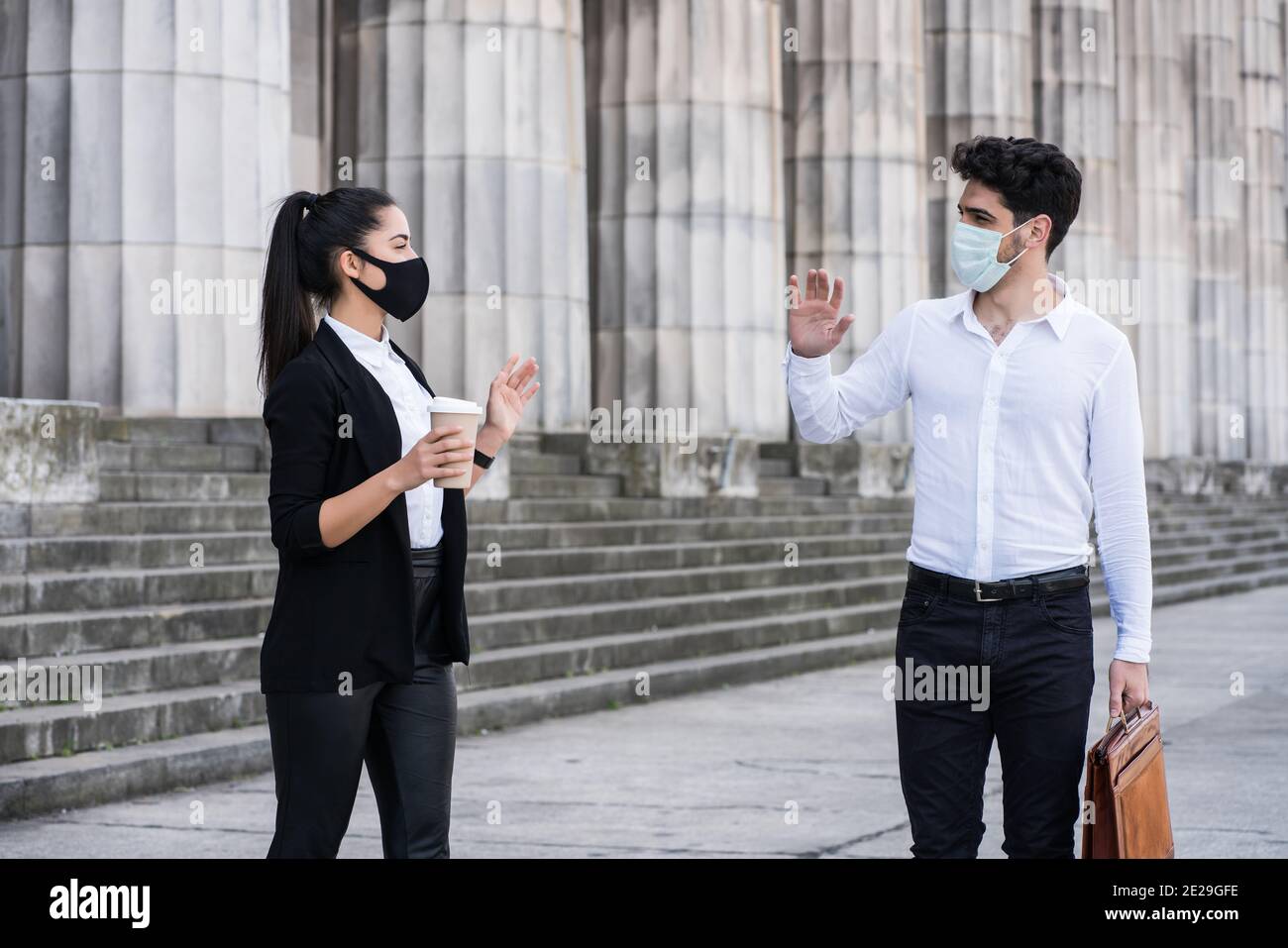 Business people keeping social distance Stock Photo - Alamy