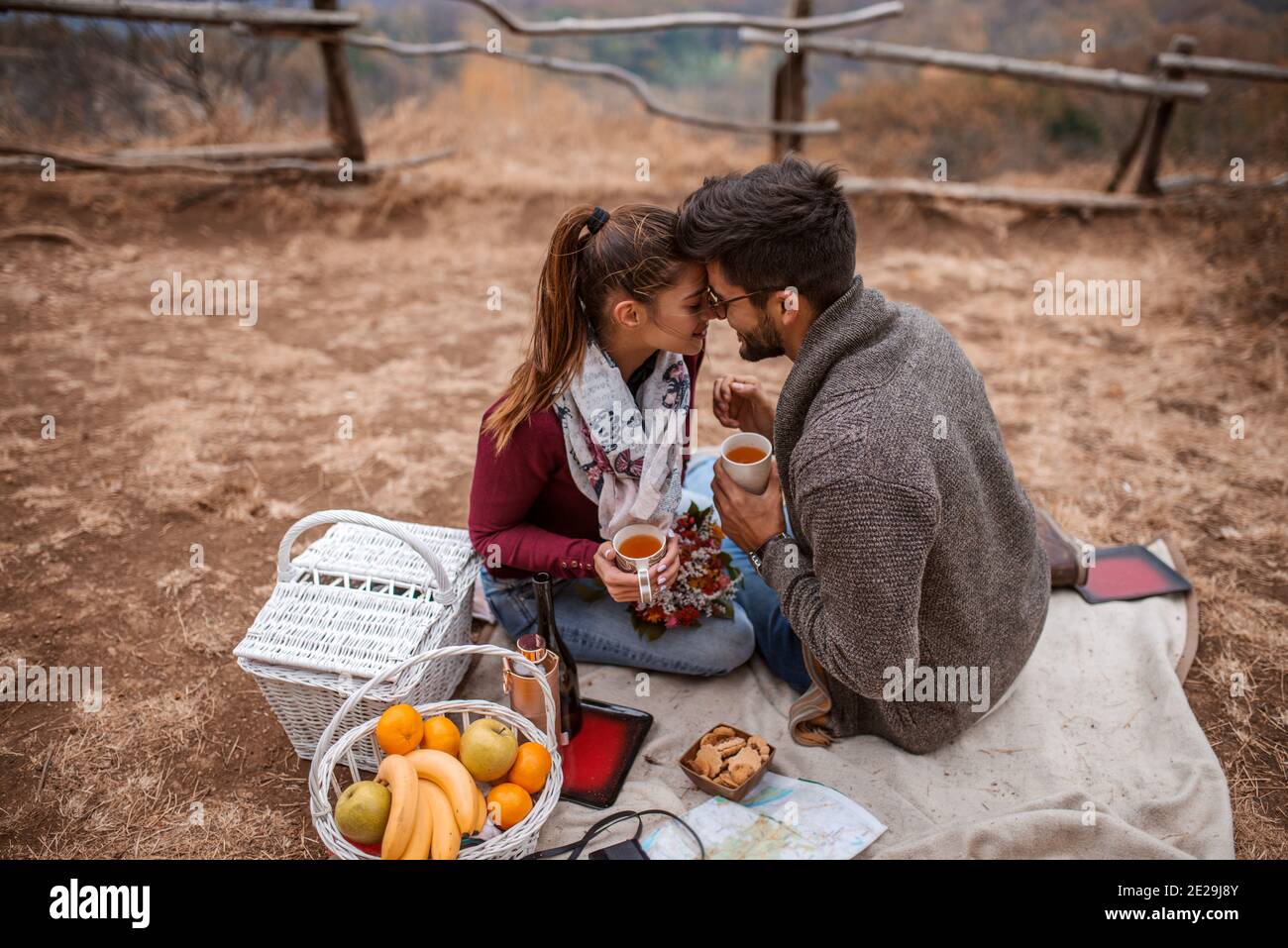 Couple Cuddling On Picnic Blanket High Resolution Stock Photography and ...