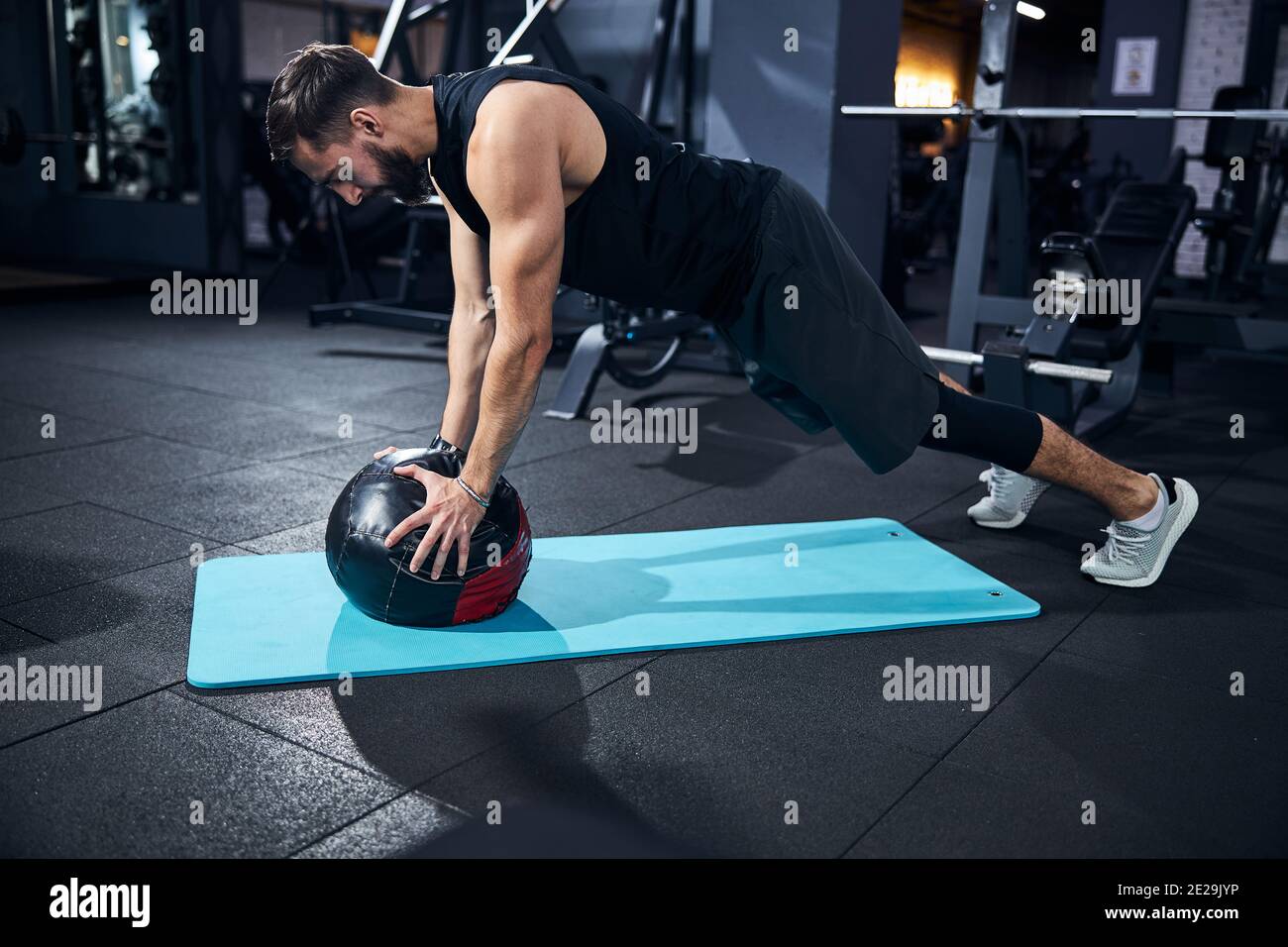 Strong sportsman doing plank hi-res stock photography and images - Alamy
