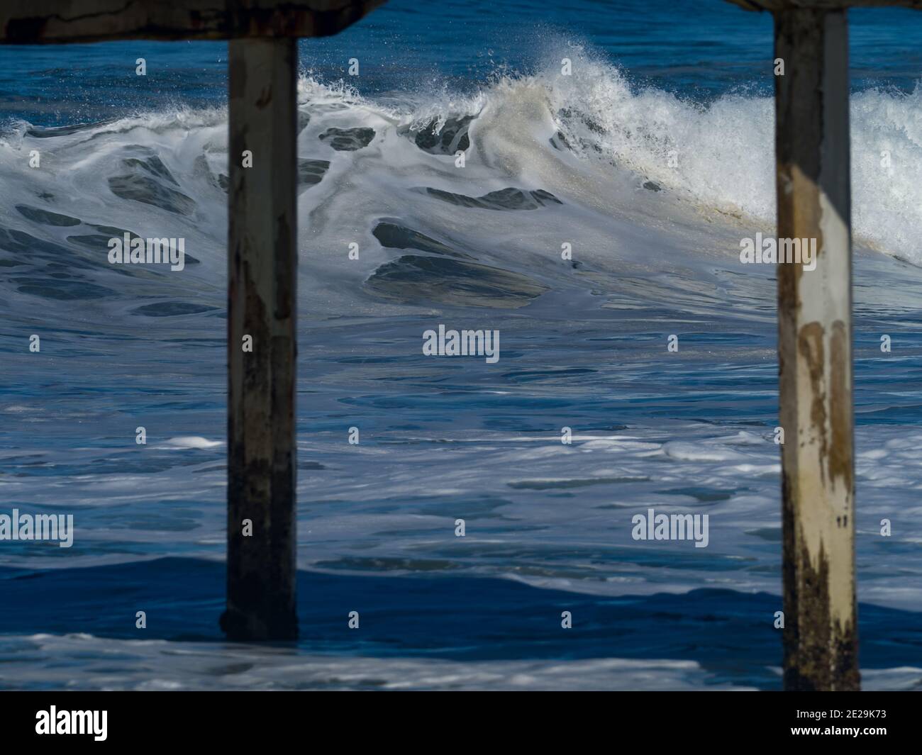 Huge waves near Ocean Beach pier, San Diego, California with a large ...