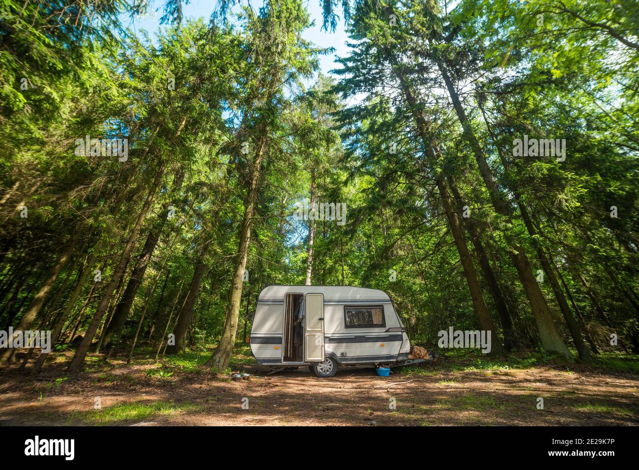 Camper in the forest hi-res stock photography and images - Alamy