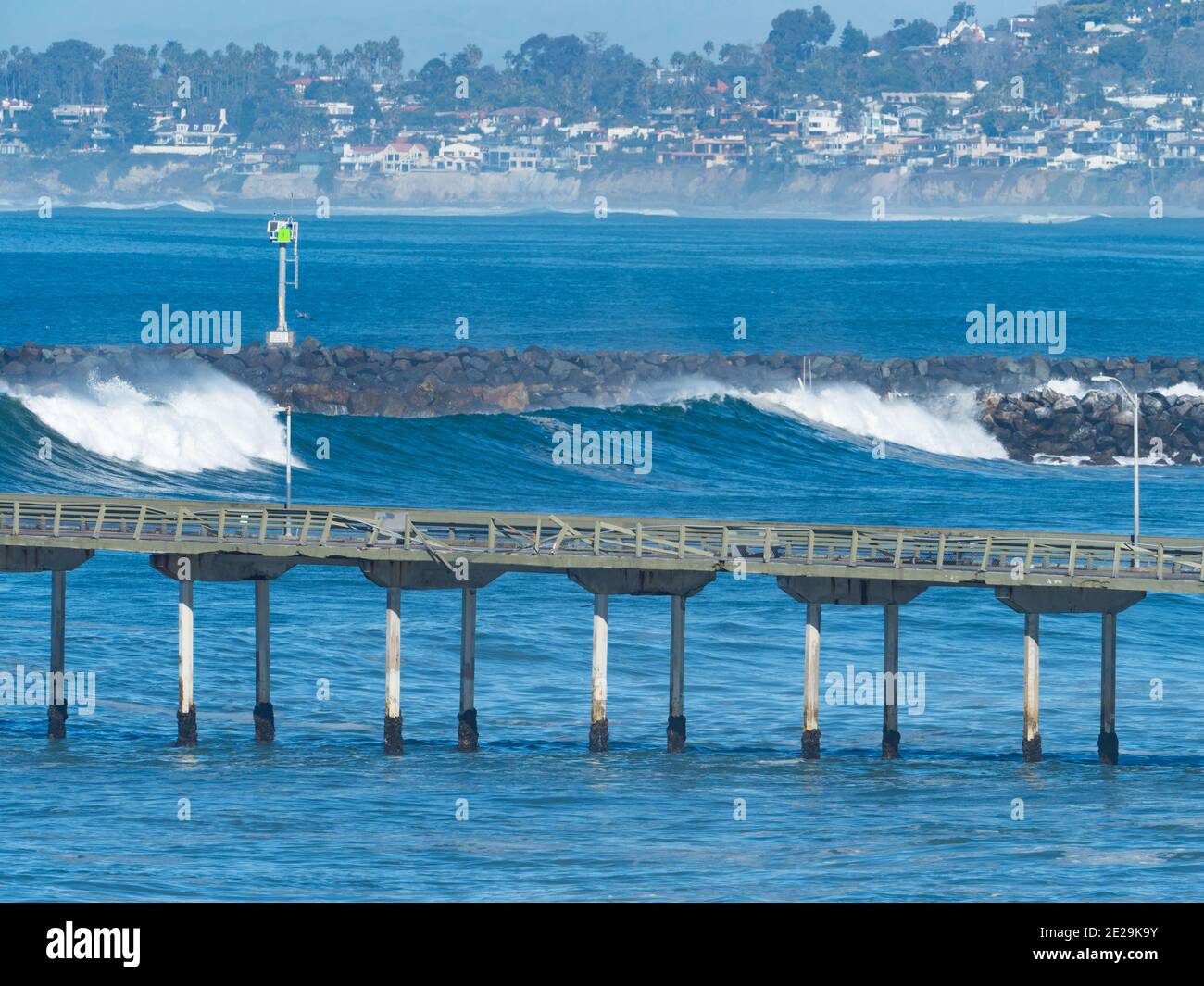 Huge waves near Ocean Beach pier, San Diego, California with a large ...