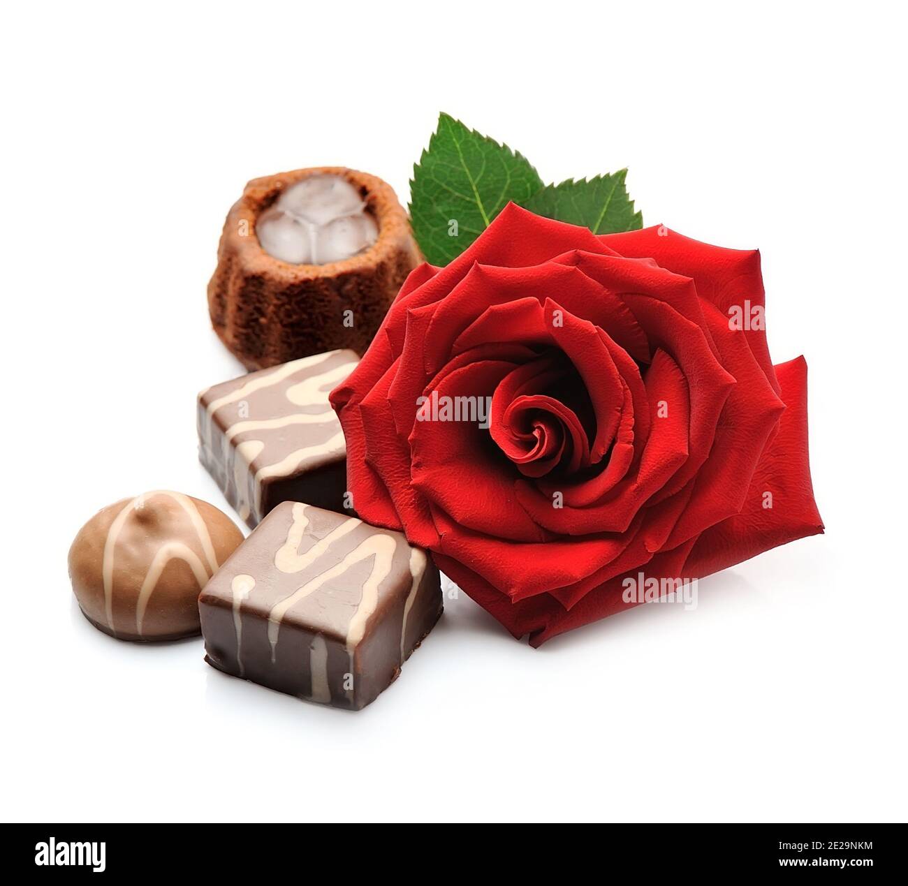 Chocolate candy and red rose flowers isolated on white backgrounds ...