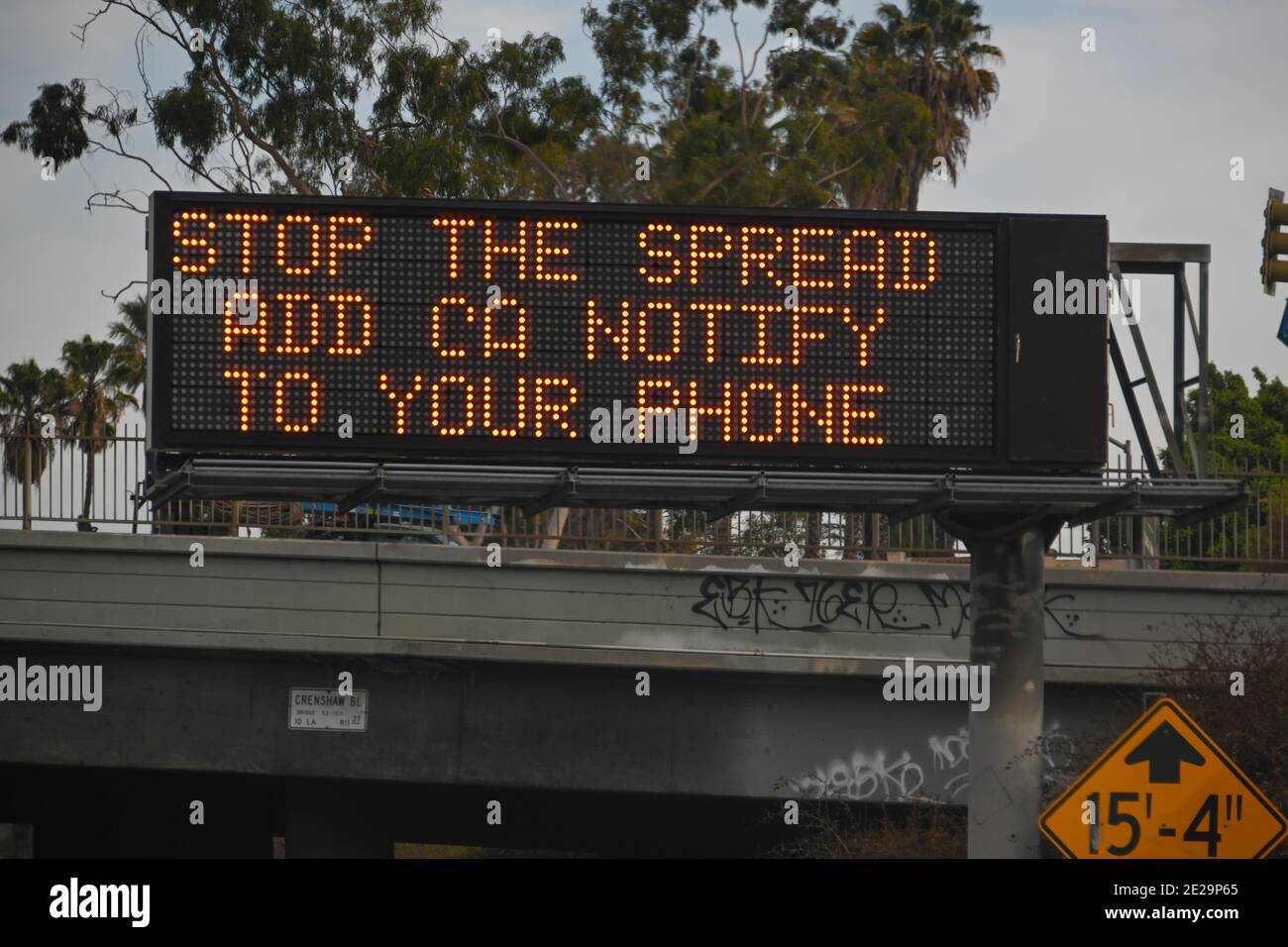 A CalTrans message board reads “Help Save Lives Add CA Notify App To ...