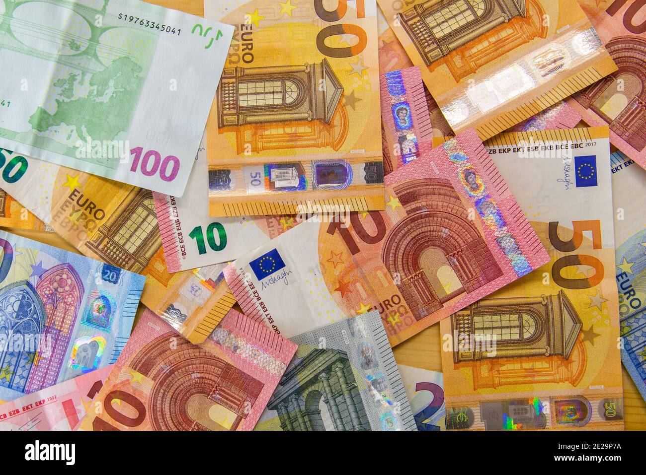 Pile of euro banknotes as background. Money concept Stock Photo - Alamy
