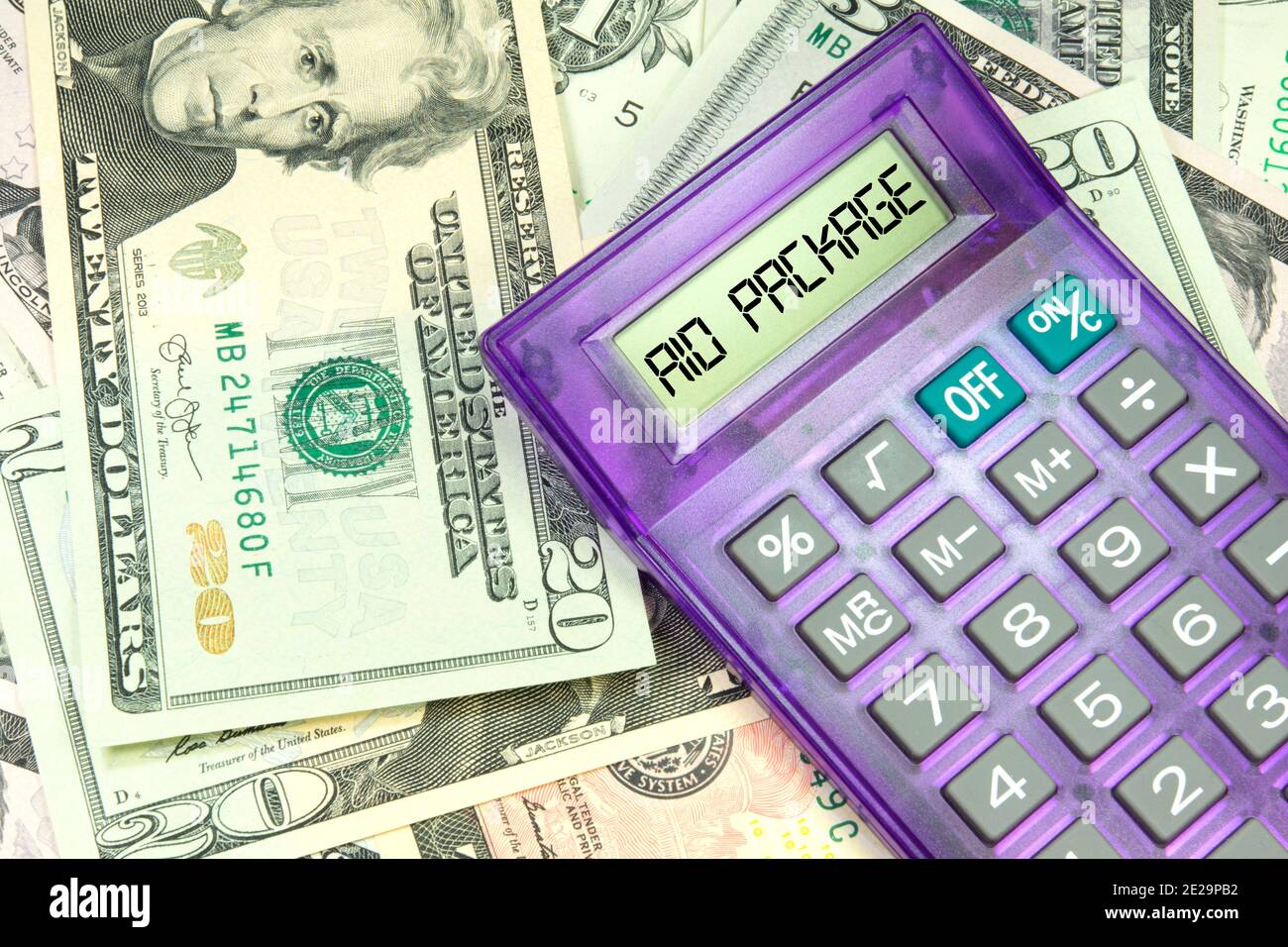 Dollar bills, calculator and aid package for the US economy Stock Photo ...