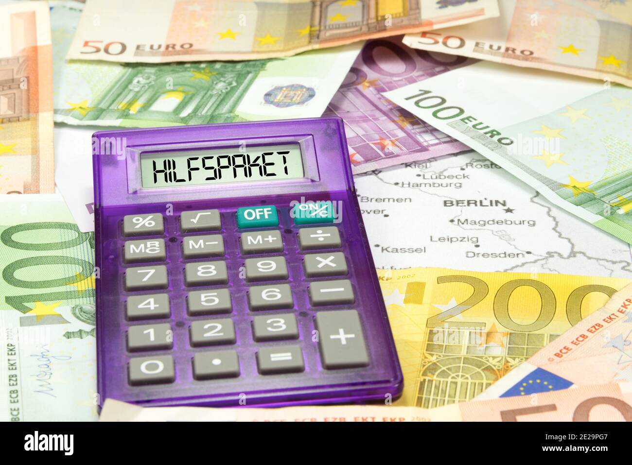 Euro banknotes, map of Germany, calculator and aid package for the ...