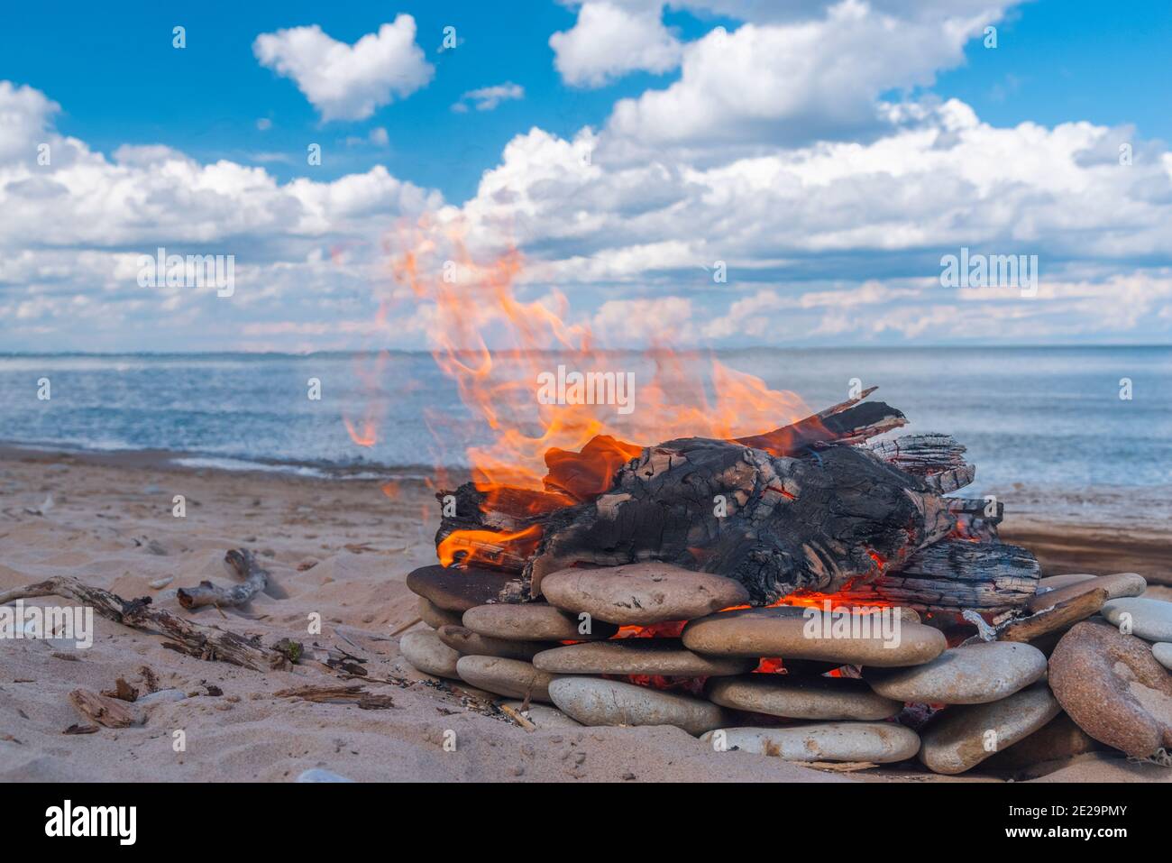 a fire by the sea Stock Photo - Alamy