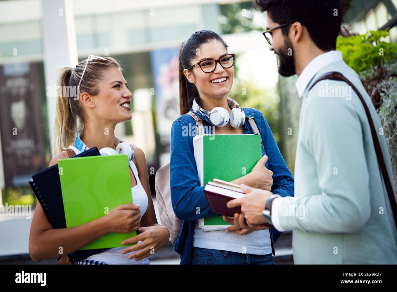 College students studying on university campus outdoor Stock Photo - Alamy