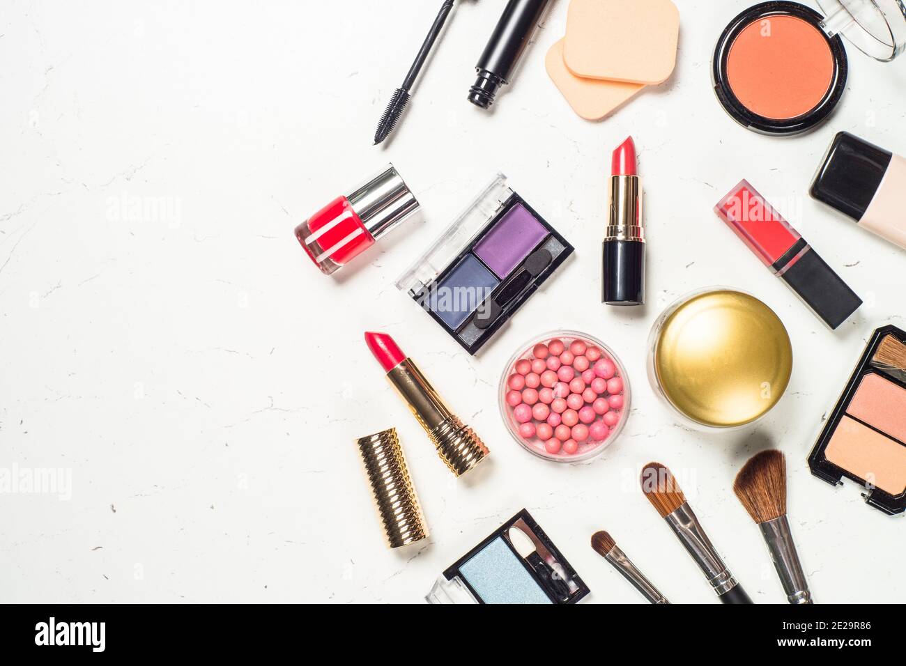 Makeup professional cosmetics on white background Stock Photo - Alamy
