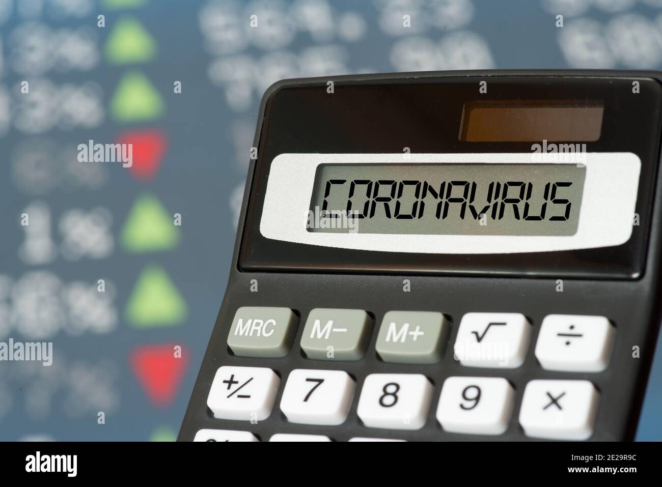 Stock exchange, calculator and coronavirus Stock Photo - Alamy