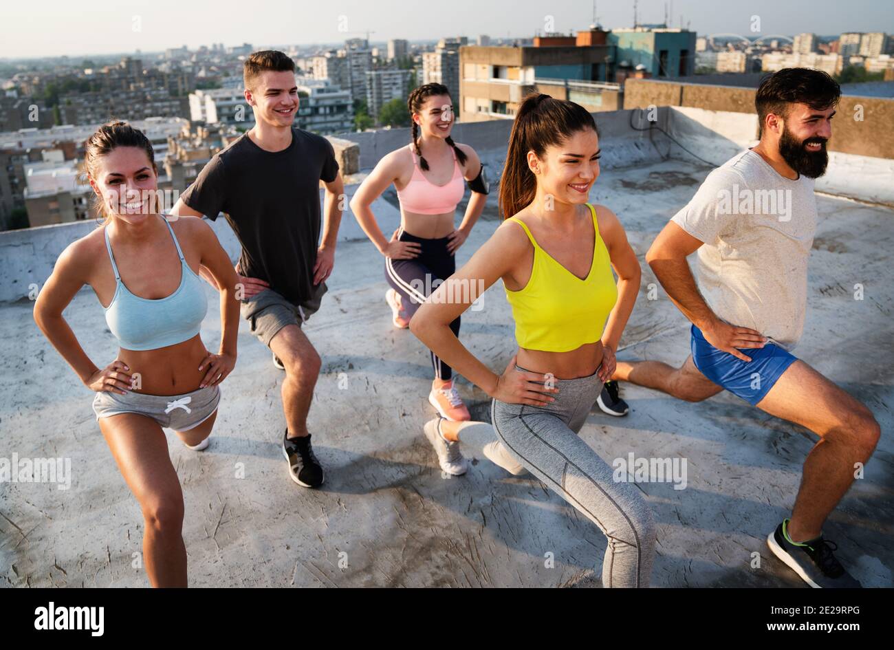 Fitness, sport, training and lifestyle concept. Group of fit people ...
