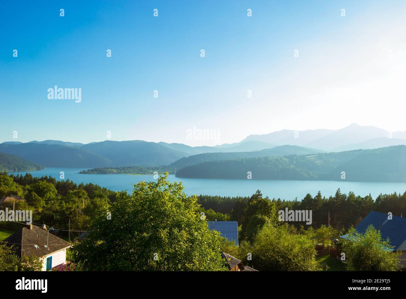 landscape of Lake Bicaz surrounded by mountains in Romania Stock Photo ...
