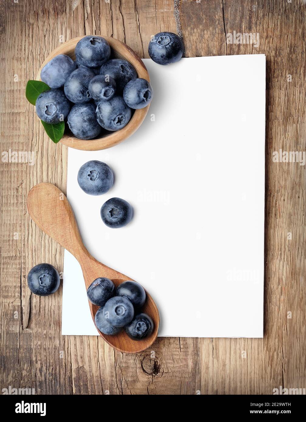 Recipe book with blueberry on wooden backgrounds Stock Photo - Alamy