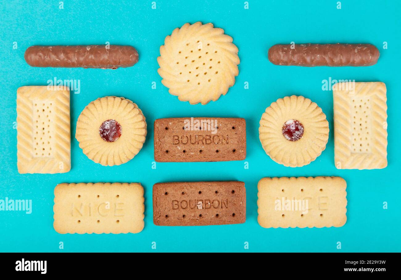 Assorted biscuits viewed from above on coloured background Stock Photo ...
