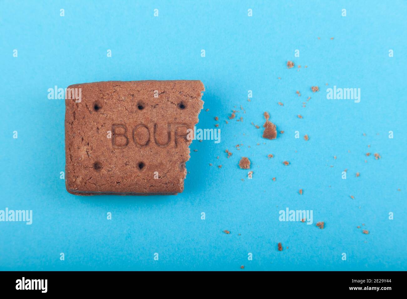 Bourbon biscuits isolated on a blue background Stock Photo - Alamy