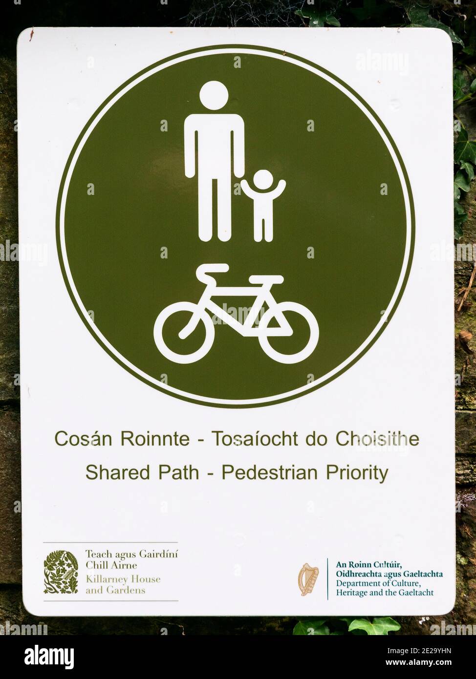 Shared path with pedestrian priority bilingual sign in Gaelic Irish and ...