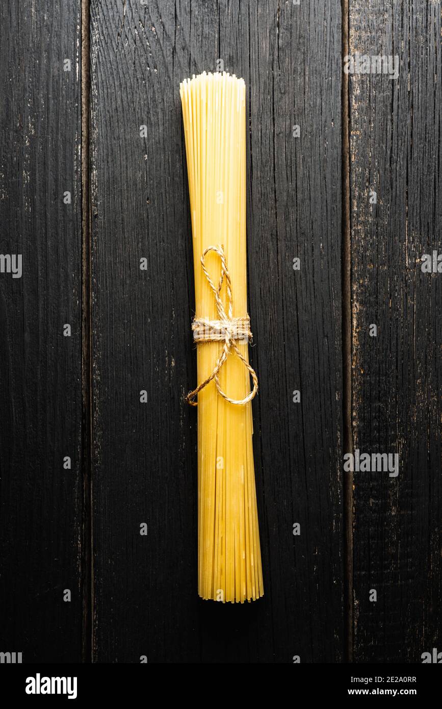 Dried spaghetti on rustic hi-res stock photography and images - Alamy