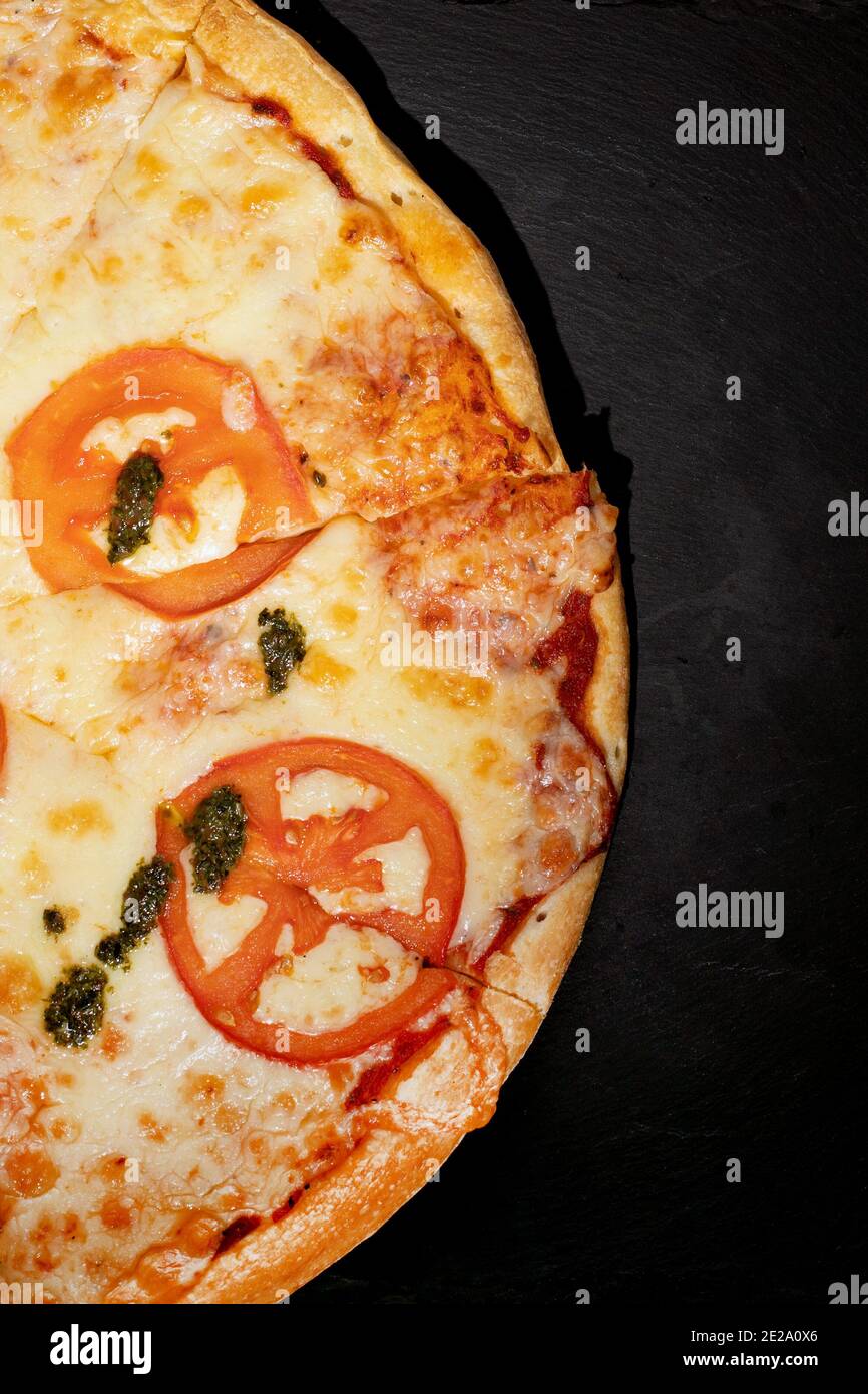 Half pizza on plate hi-res stock photography and images - Alamy