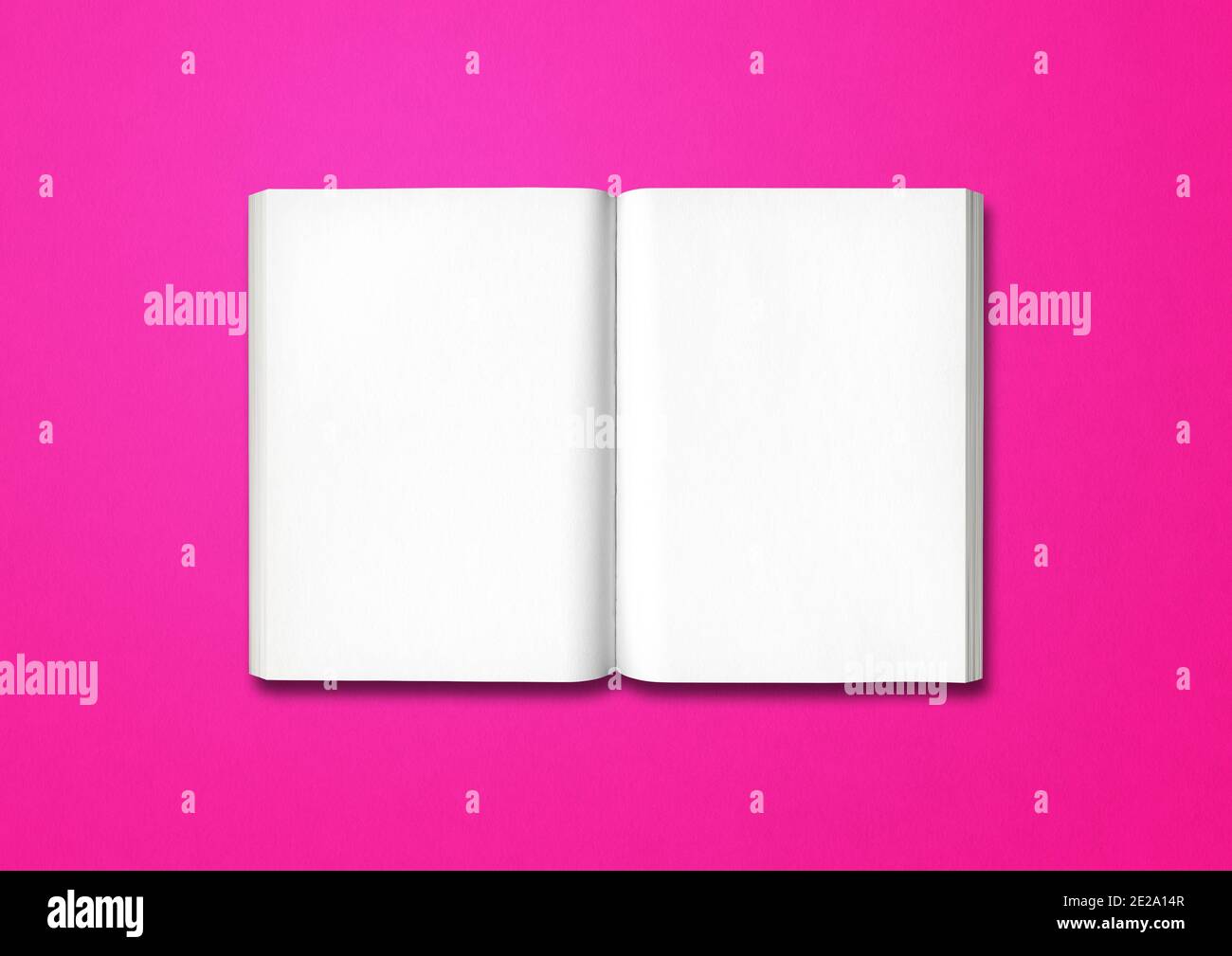 Open book isolated on a pink background Stock Photo - Alamy