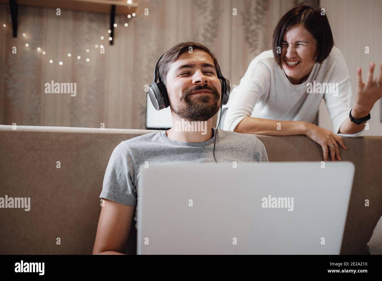 Annoyed young dark haired female expressive yelling at dark haired ...