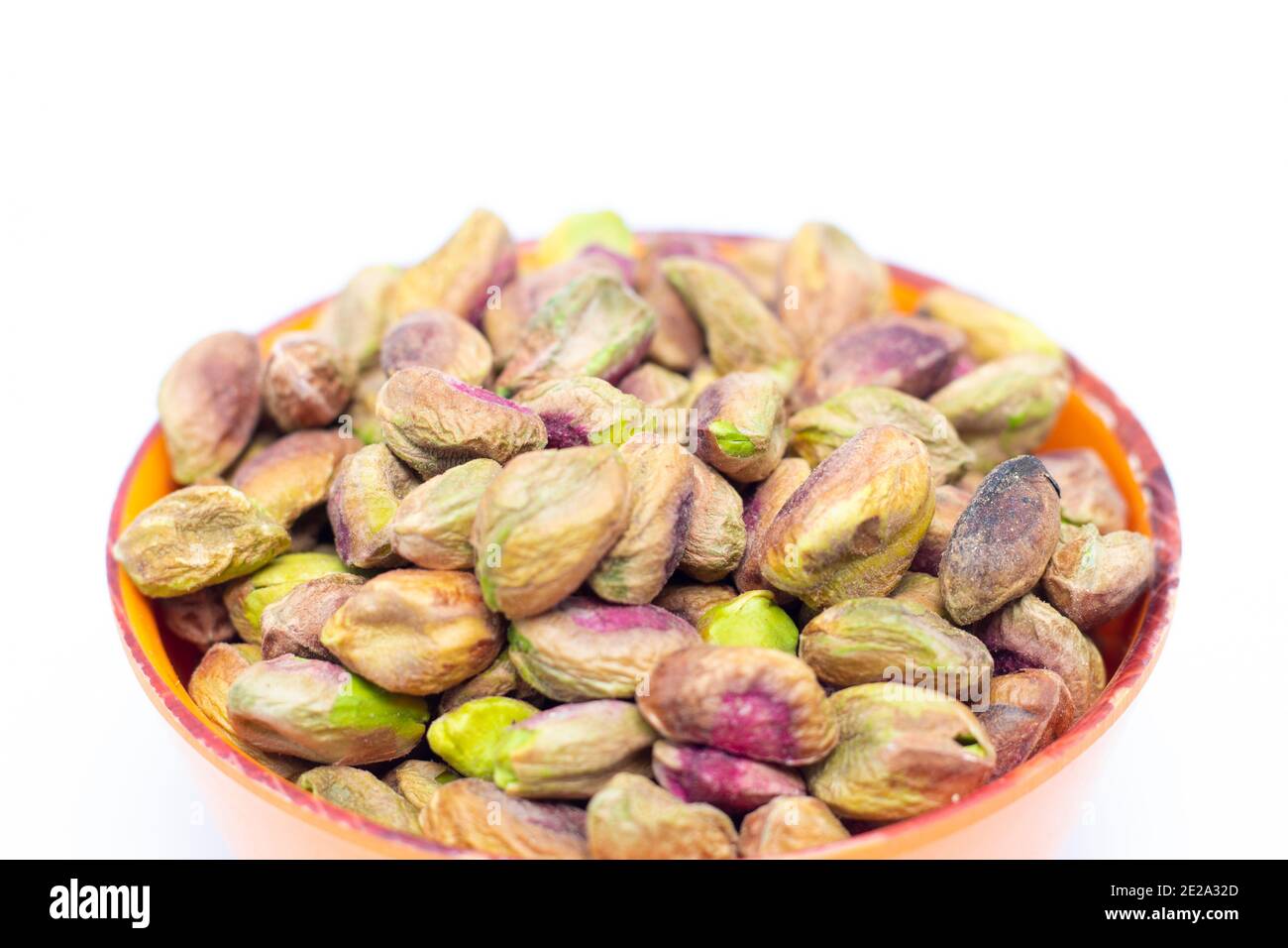 Fresh raw peeled pistachios isolated on white background Stock Photo ...