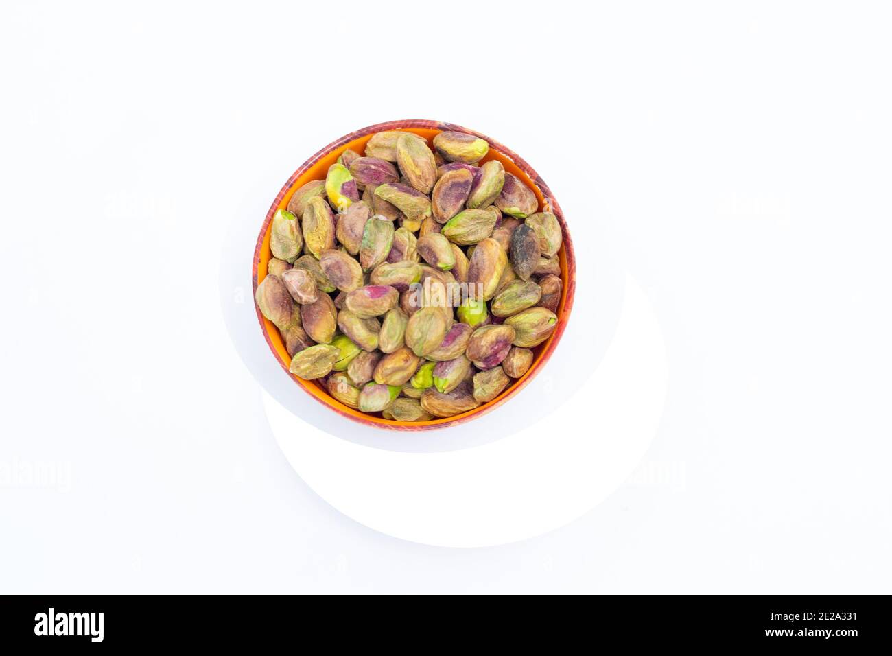 Fresh raw peeled pistachios isolated on white background Stock Photo ...