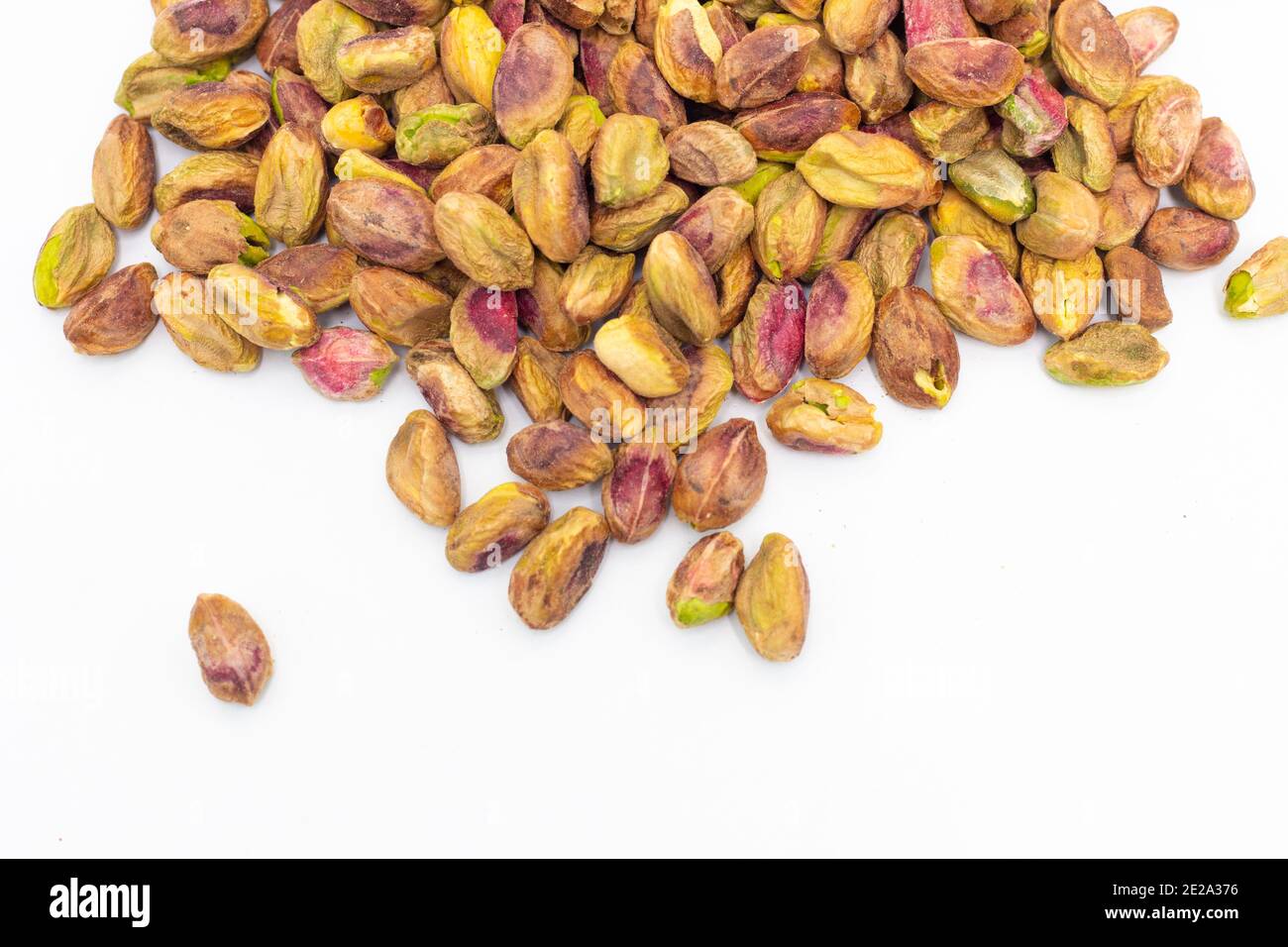 Fresh raw peeled pistachios isolated on white background Stock Photo ...