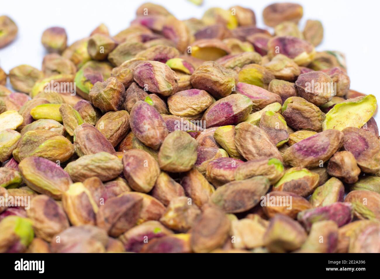 Fresh raw peeled pistachios isolated on white background Stock Photo ...