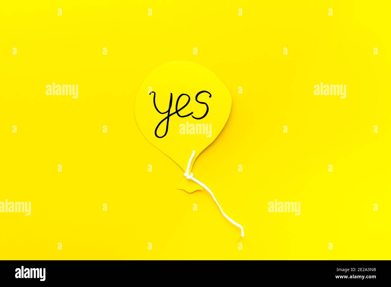 Yes agreement - decision concept. Word Yes on paper banner, top view ...