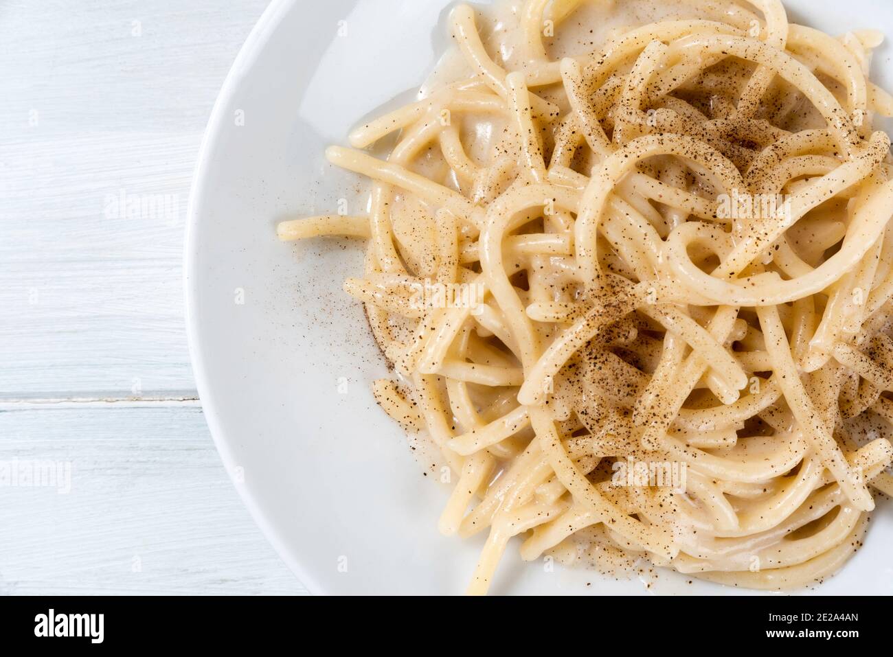 Dish of delicious cacio & pepe spaghetti, a typical recipe of italian ...