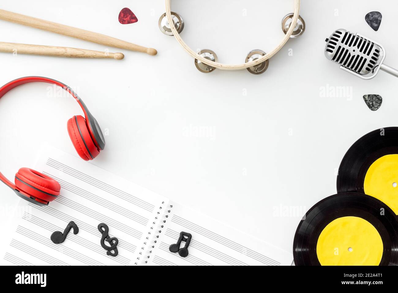 Flat lay of music background - instrument with sheet music, top view ...