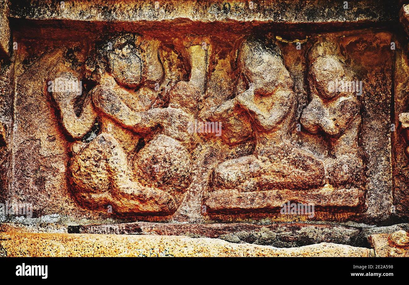 Ancient sculpture of men and women engraved in an o Stock Photo - Alamy