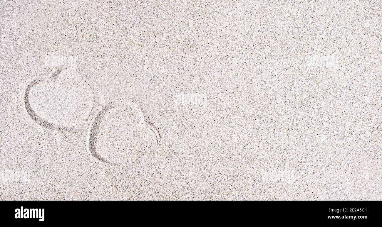 A heart symbol imprint on sand, copy space, banner, tropical summer ...