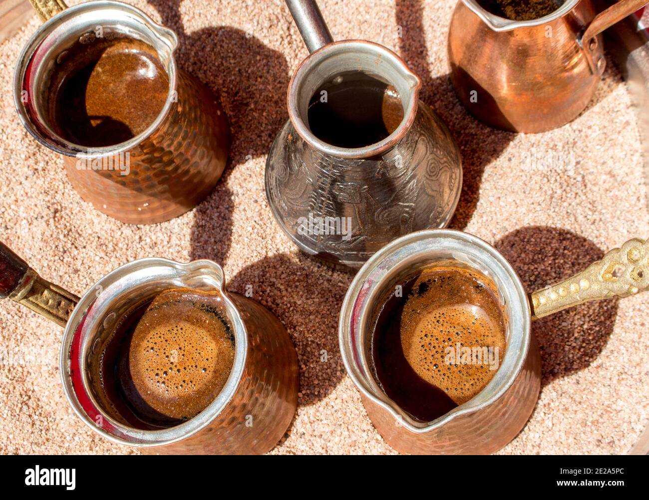 The turkish coffee in cezve in the hot sand Stock Photo - Alamy