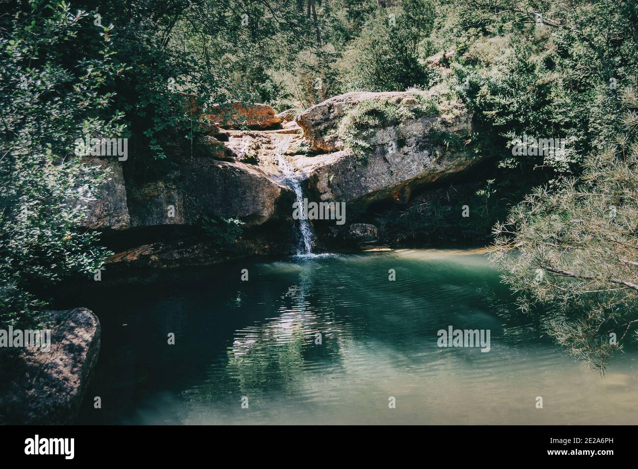 landscape with a pool with waterfall in a place of catalonia, spain ...