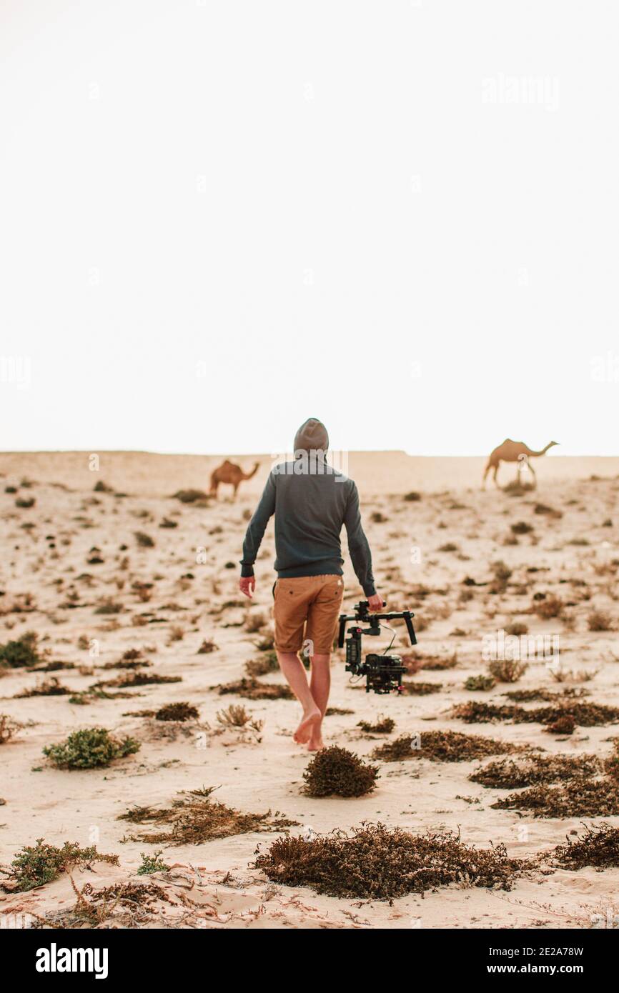 Vertical video man walking in hi-res stock photography and images - Alamy