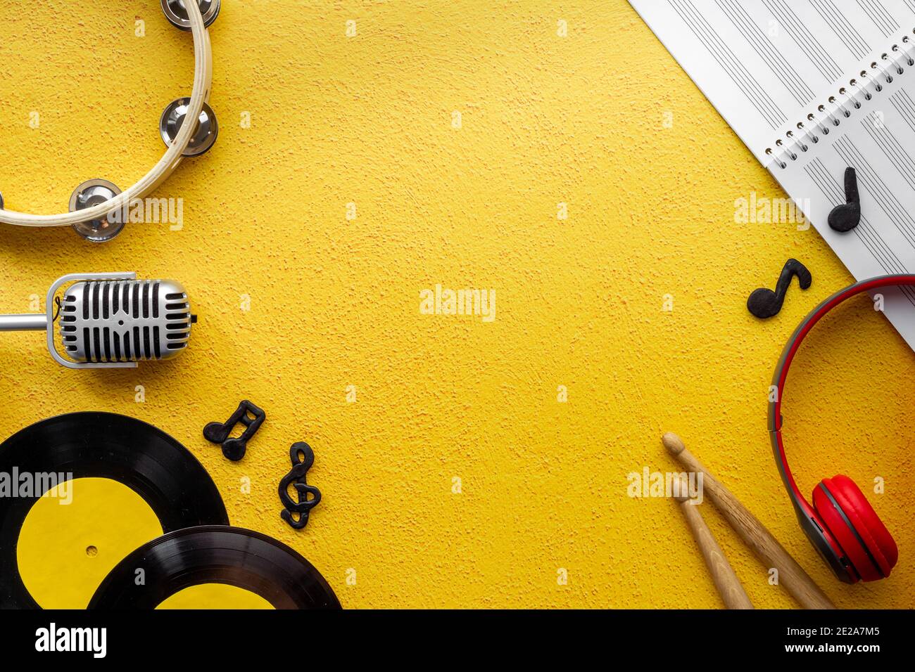 Frame of of music background - instrument with sheet music, top view ...